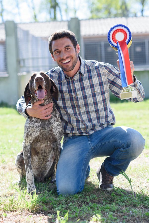 Man with winner dog stock image. Image of price, show - 265787701