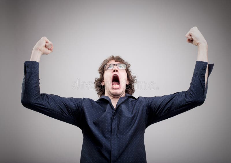 Man Winning and Exulting with a Strong Expression Stock Image - Image ...