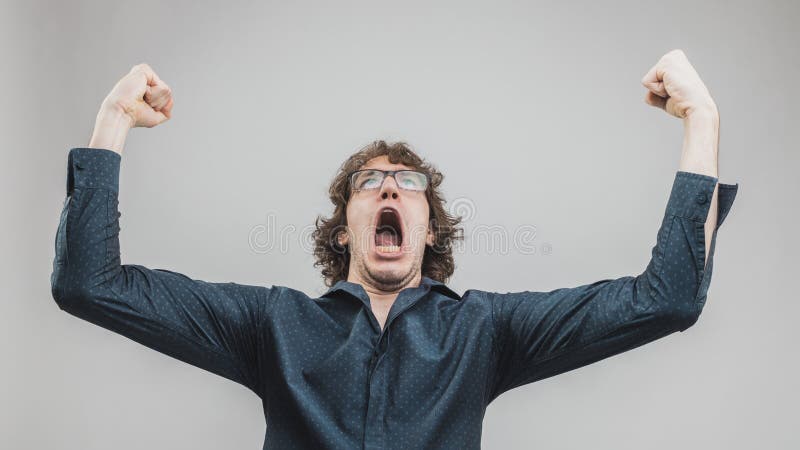 Man Winning and Exulting with a Strong Expression Stock Image - Image ...