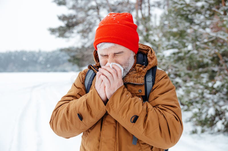 Man in a Winter Forest Looking Sick and Got Running Nose Stock Image ...