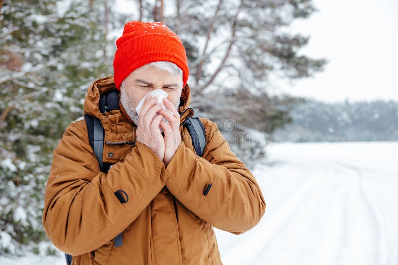 Man in a Winter Forest Looking Sick and Got Running Nose Stock Image ...