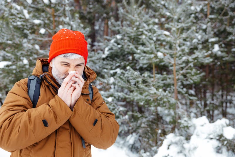 Man in a Winter Forest Looking Sick and Got Running Nose Stock Image ...