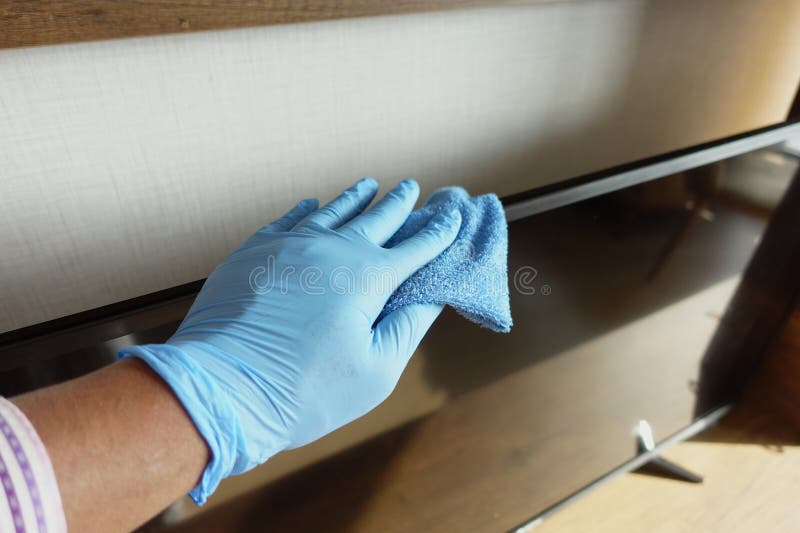A Man Wipes Dust from a Plasma TV Stock Image - Image of sanitize ...