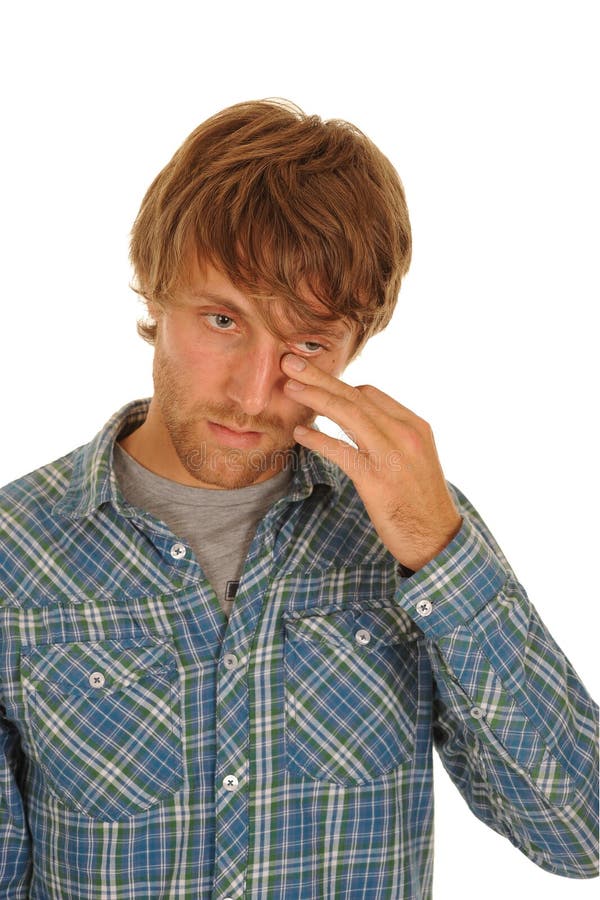 Man wiping tears from eye stock photo. Image of adult - 21878130
