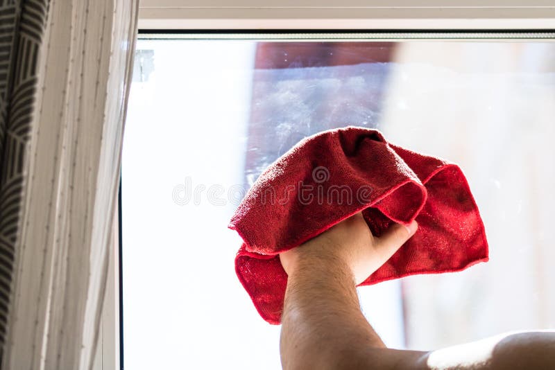 Man Wiping Window Using Red Microfiber Rug, Cleaning Services Concept ...