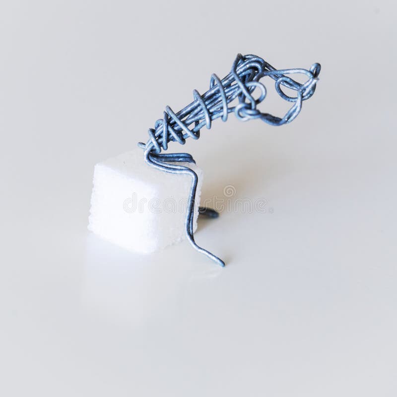 A Man of Wire Sits in the Pose of a Thinker, Raising His Hand To His ...