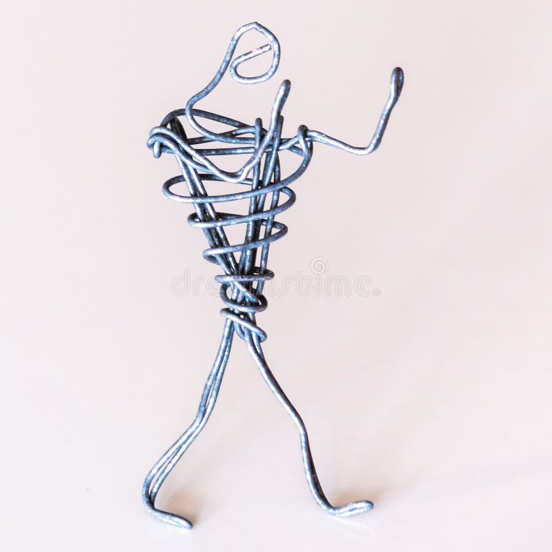 A Man of Wire Stands in a Boxing Stance, Symbolizing the Struggle ...