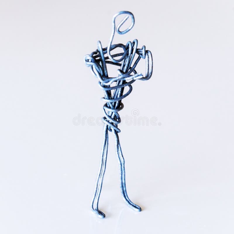 A Man of Wire Stands in a Closed Position with His Hands on His Chest ...