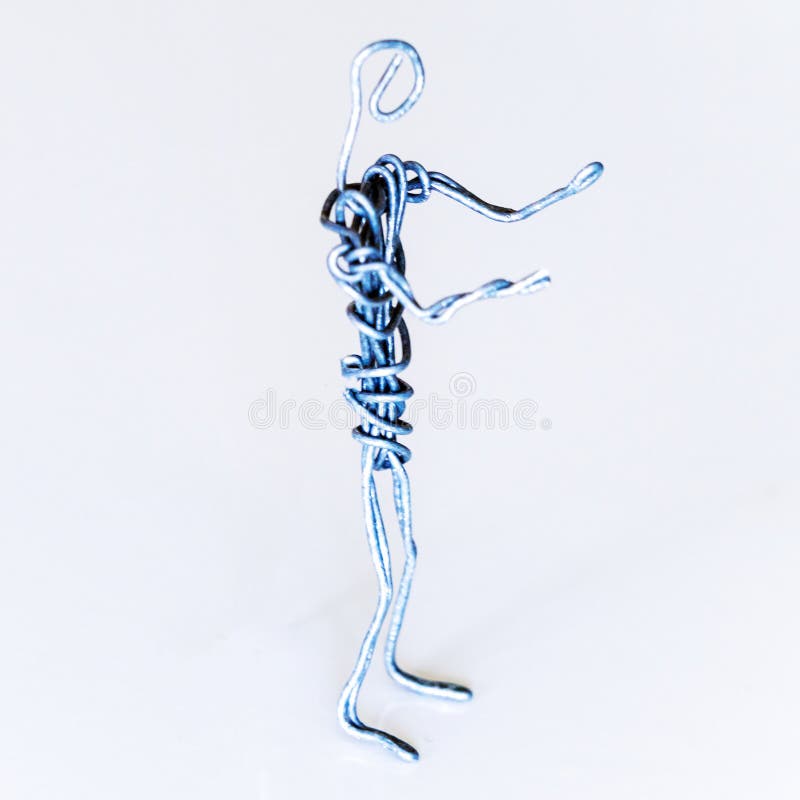 A Man of Wire Stands Gesturing with His Hands, Symbolizing Conversation ...
