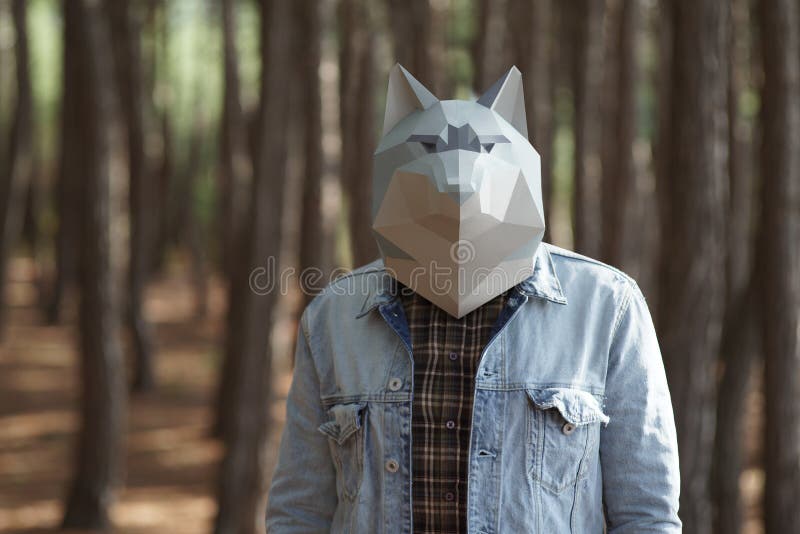 Man with Wolf Mask on Head. Stock Image - Image of adult, outdoors ...