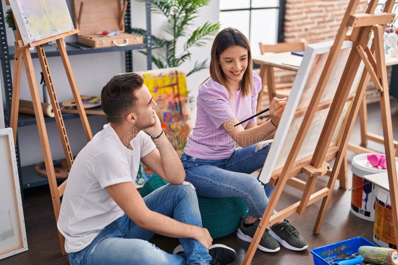 Man and Woman Artists Couple Smiling Confident Drawing at Art Studio ...