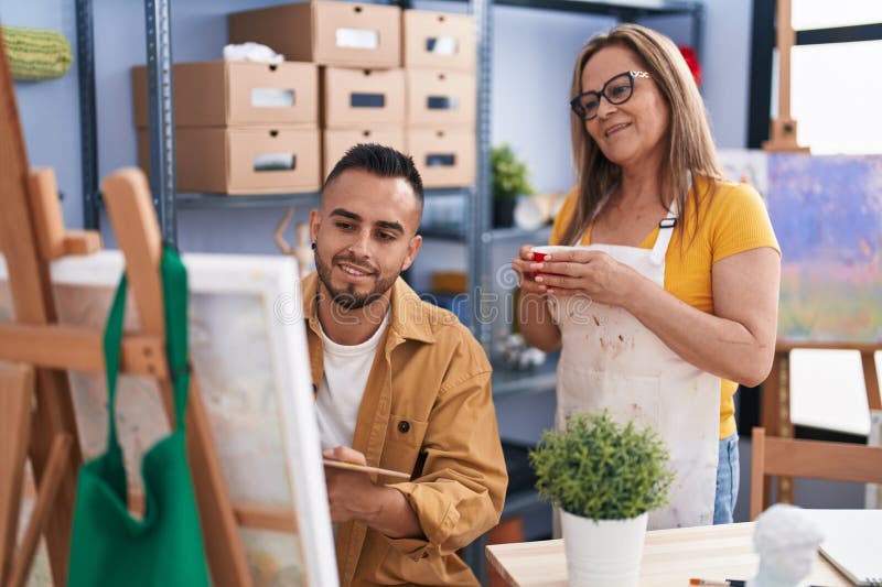 Man and Woman Artists Drinking Coffee Drawing at Art Studio Stock Image ...