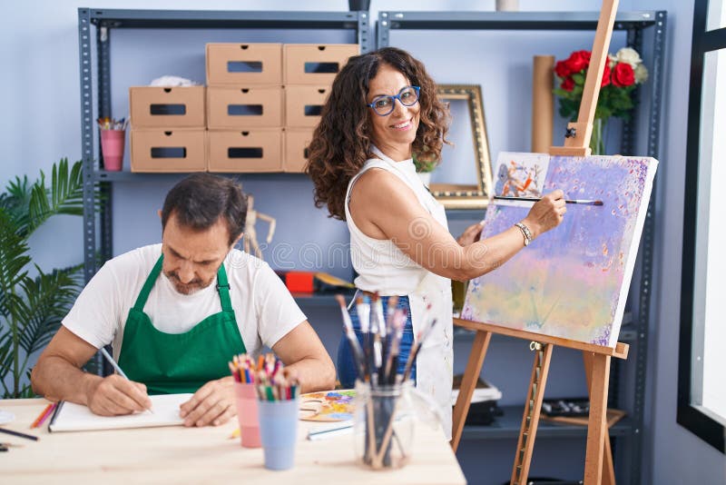 Man and Woman Artists Smiling Confident Drawing at Art Studio Stock ...