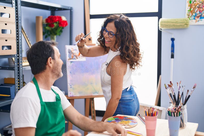 Man and Woman Artists Smiling Confident Drawing at Art Studio Stock ...
