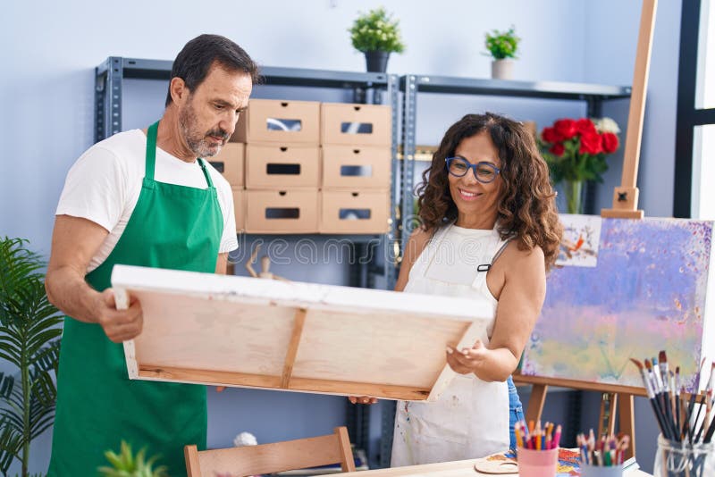 Man and Woman Artists Smiling Confident Looking Draw at Art Studio ...