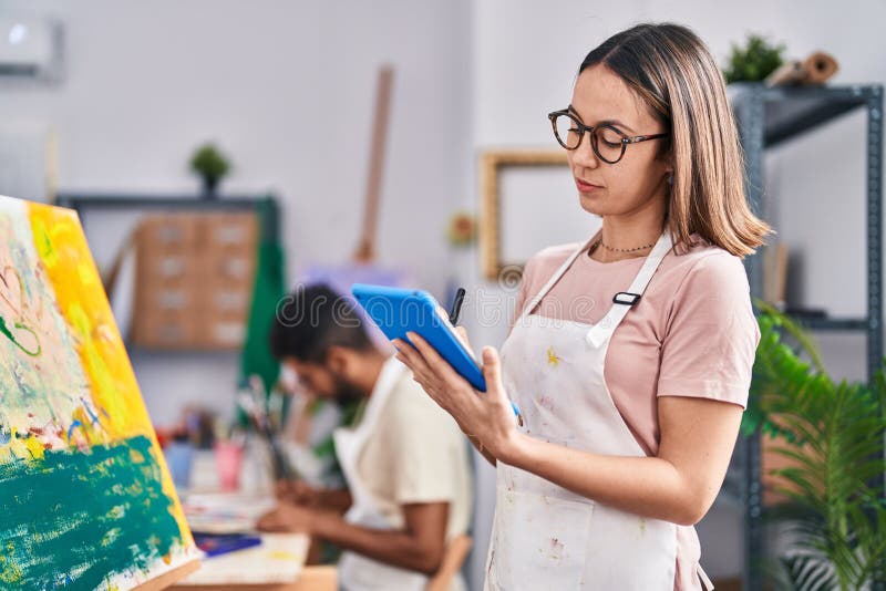 Man and Woman Artists Using Touchpad Drawing at Art Studio Stock Photo ...