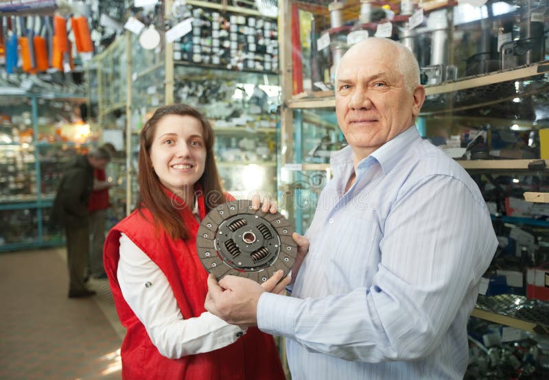 Man and Woman in Auto Parts Store Stock Photo - Image of purchase ...