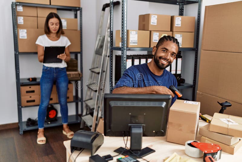 Man and Woman Business Partners Scanning Package Using Barcode Reader ...