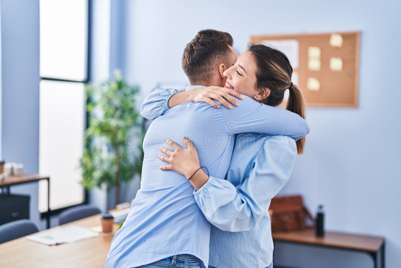 Man and Woman Business Workers Hugging Each Other at Office Stock Photo ...