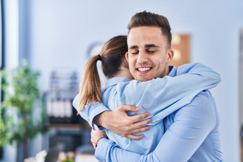 Man and Woman Business Workers Hugging Each Other at Office Stock Image ...