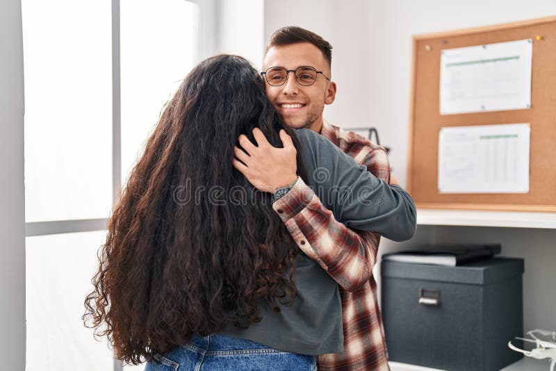 Man and Woman Business Workers Hugging Each Other at Office Stock Photo ...