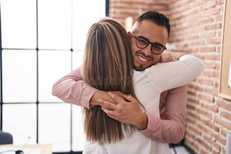 Man and Woman Business Workers Hugging Each Other at Office Stock Image ...