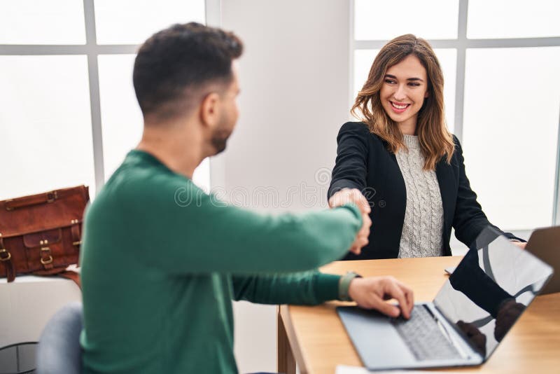 Man and Woman Business Workers Shake Hands Working at Office Stock ...