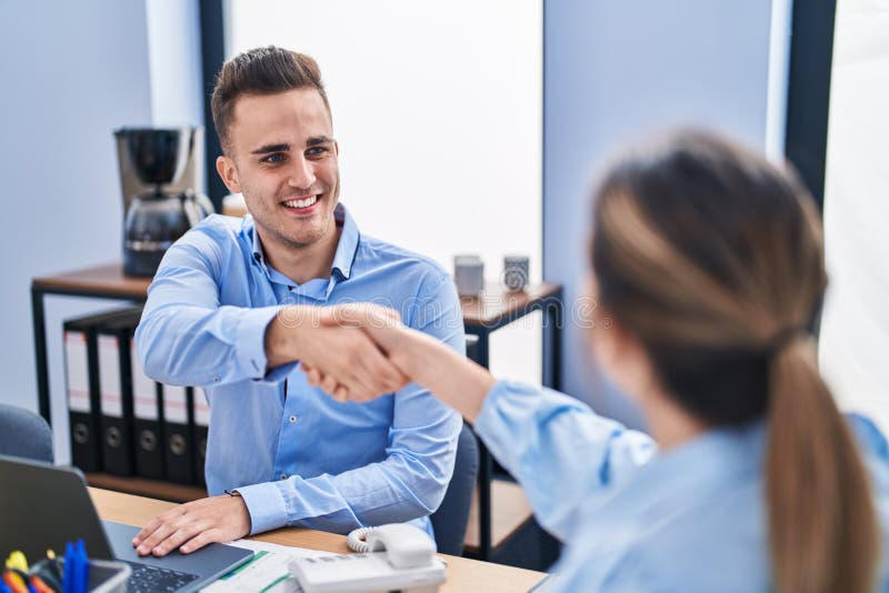 Man and Woman Business Workers Shake Hands Working at Office Stock ...
