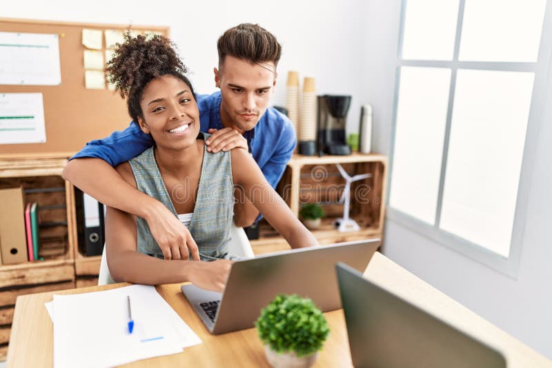 Man and Woman Business Workers Smiling Confident and Hugging Working at ...