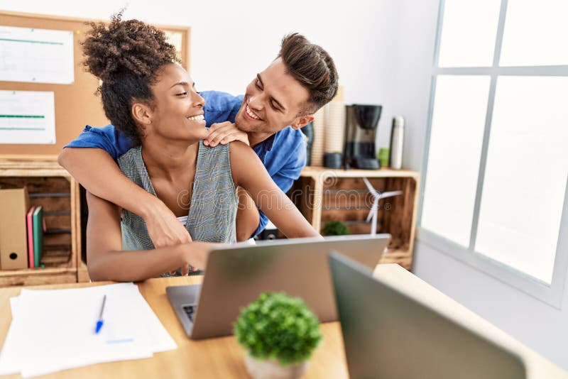 Man and Woman Business Workers Smiling Confident and Hugging Working at ...