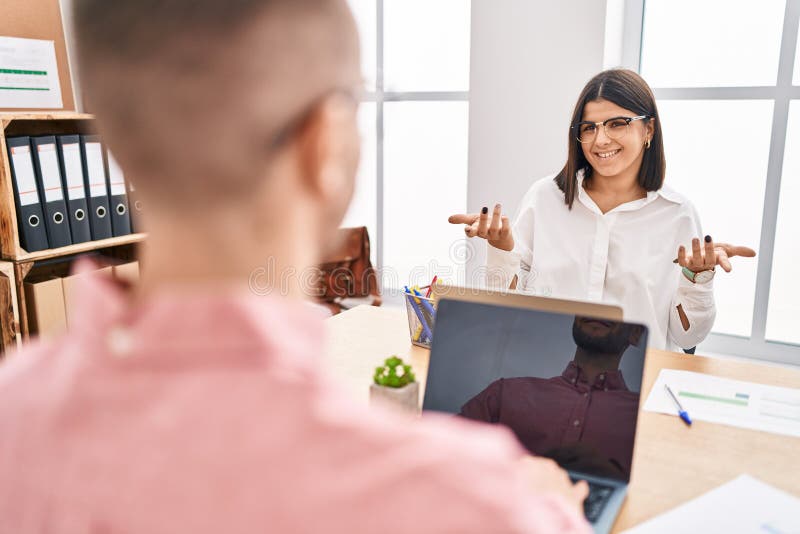 Man and Woman Business Workers Speaking and Working at Office Stock ...