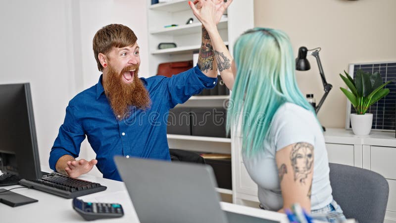 Man and Woman Business Workers Using Laptop and Computer High Five for ...