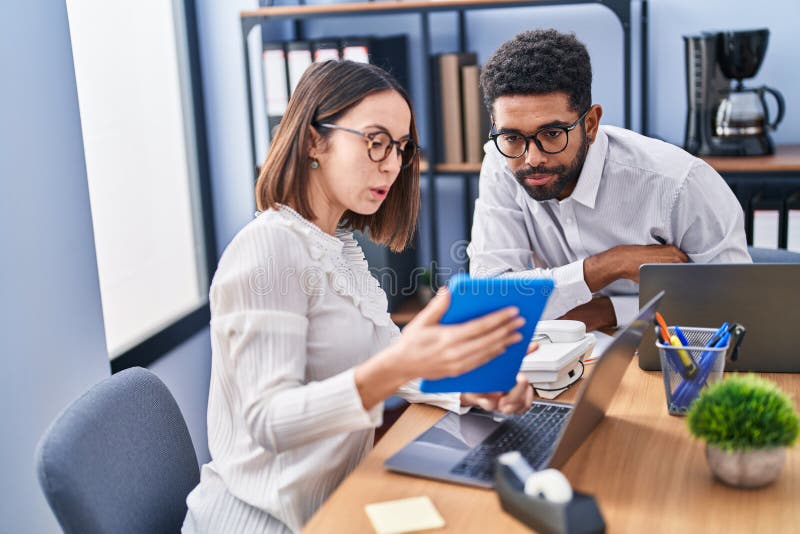 Man and Woman Business Workers Using Laptop and Touchpad at Office ...