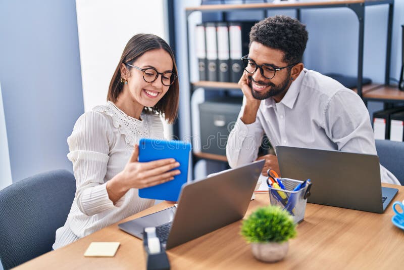 Man and Woman Business Workers Using Laptop and Touchpad at Office ...