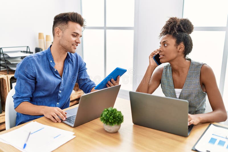 Man and Woman Business Workers Using Touchpad Talking on the Smartphone ...