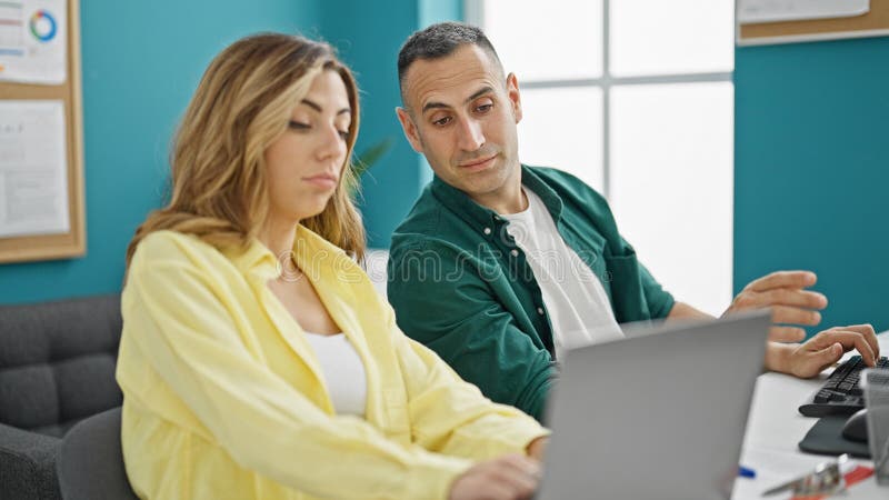 Man and Woman Business Workers Working Together at the Office Stock ...