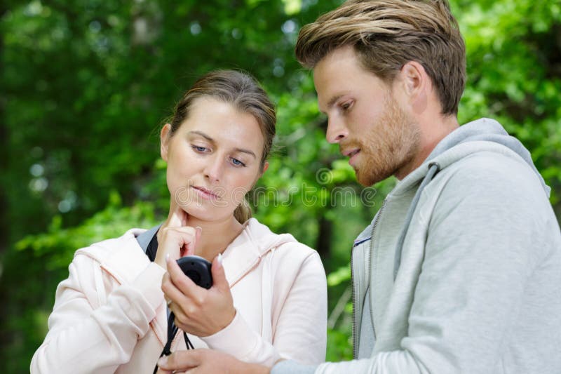 Man and Woman Check Pulse Rate Stock Photo - Image of rest, slim: 286471776