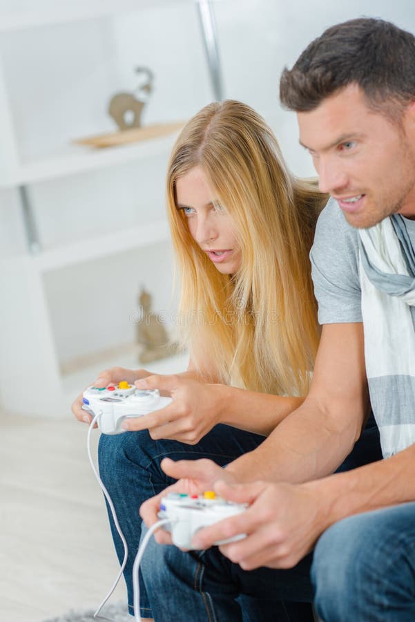 Man and Woman Competing Over Video Game Stock Image - Image of ...