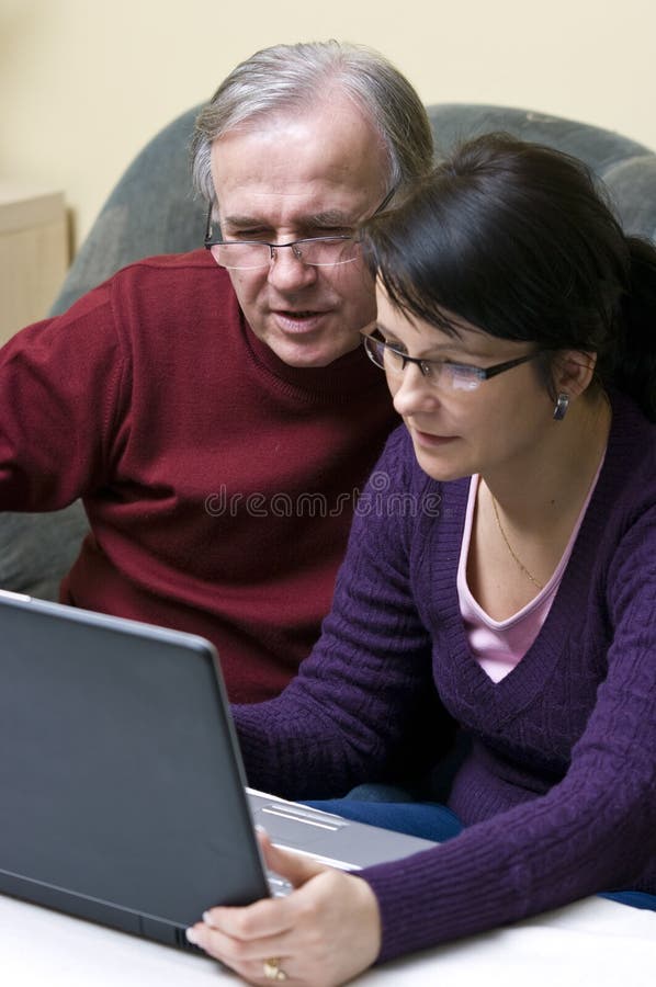 Man and woman at computer stock image. Image of working - 8356799
