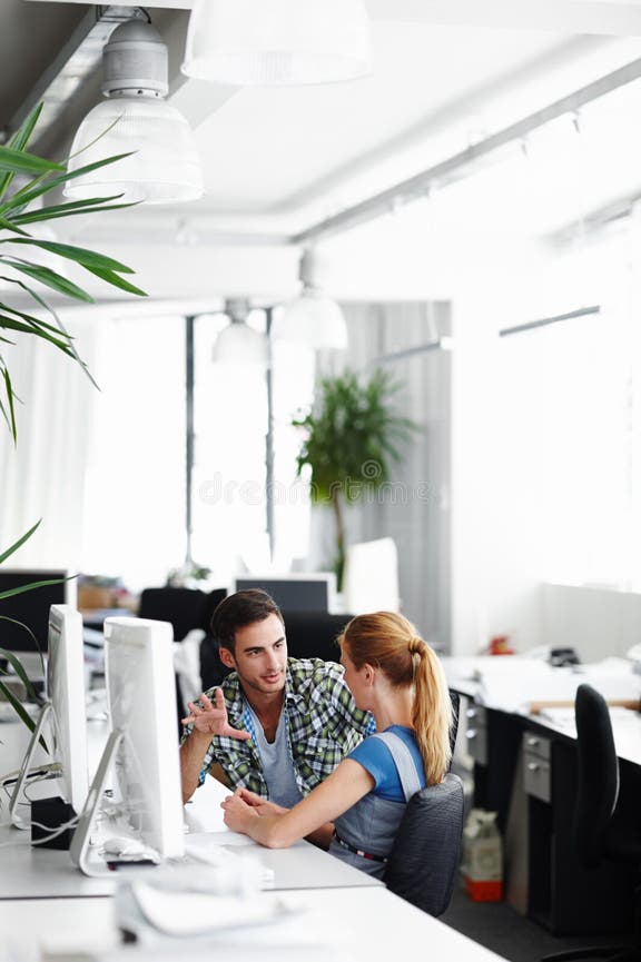 Man, Woman and Conversation at Computer for Design, Web Development or ...