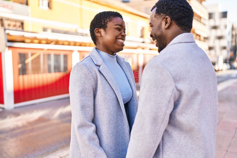 Man And Woman Couple Smiling Confident Standing Together At Street