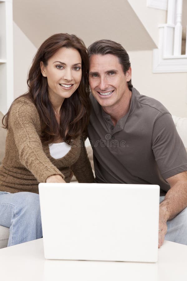 Man & Woman Couple Using Laptop Computer at Home Stock Photo - Image of ...
