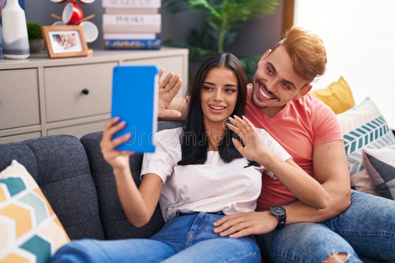 Man and Woman Couple Using Touchpad Having Video Call at Home Stock ...