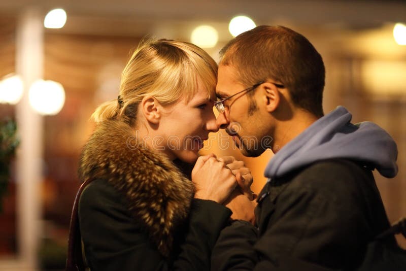 Man and Woman is Cuddling in Coldly Nightly Fall C Stock Photo - Image ...