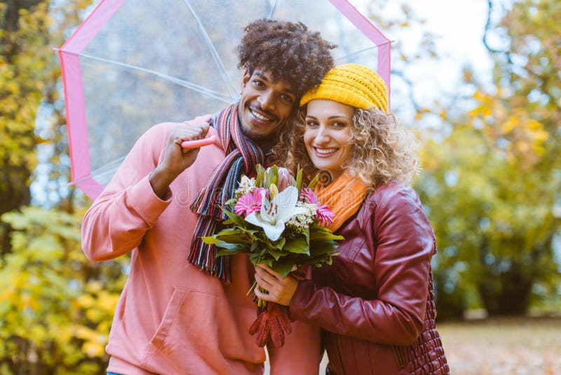 Man and Woman of Different Ethnicity Hugging in Fall Stock Image ...