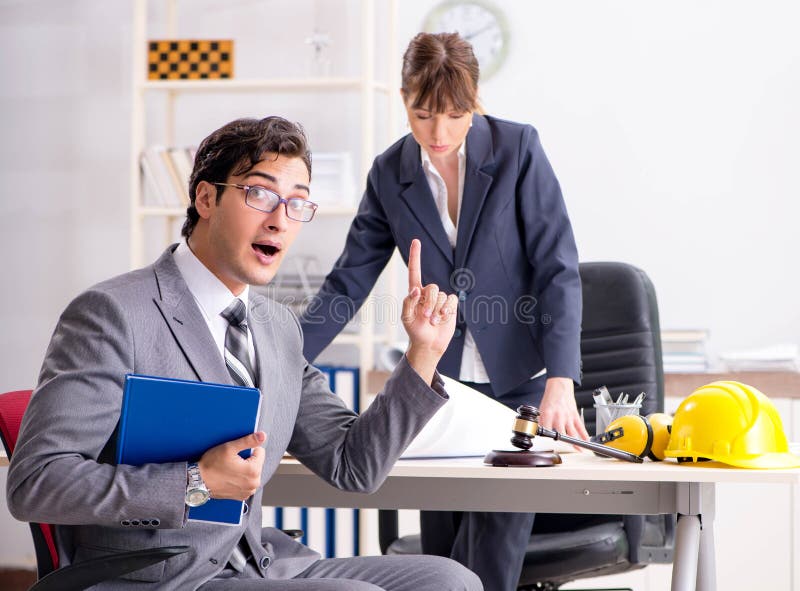 Man and Woman Discussing Construction Project Stock Photo - Image of ...