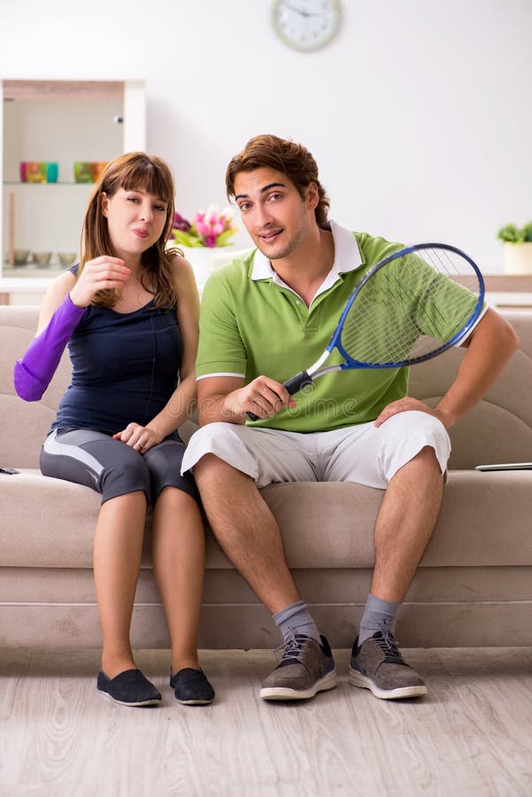 The Man and Woman Discussing Elbow Strap Stock Photo - Image of ...