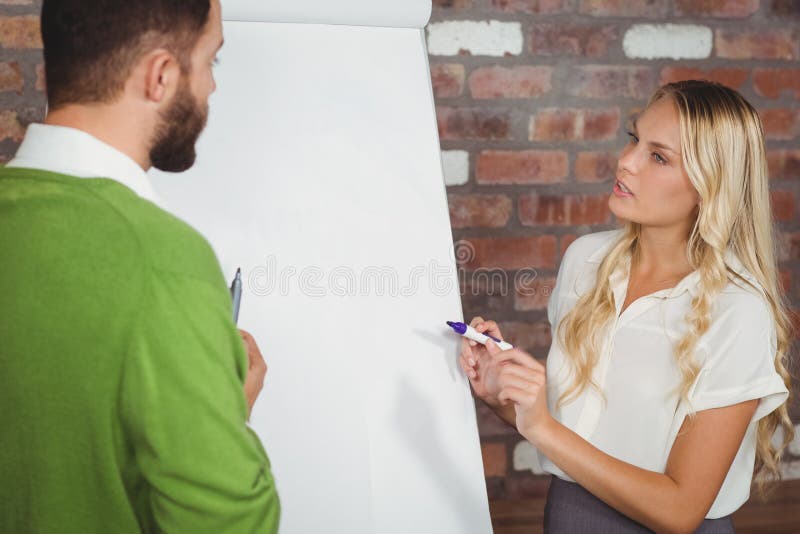 Man and Woman Discussing during Presentation Stock Photo - Image of ...