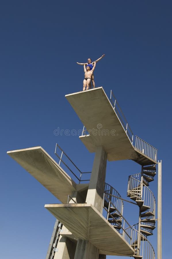 Woman about To Dive Backwards Off a Diving Board Stock Image - Image of ...