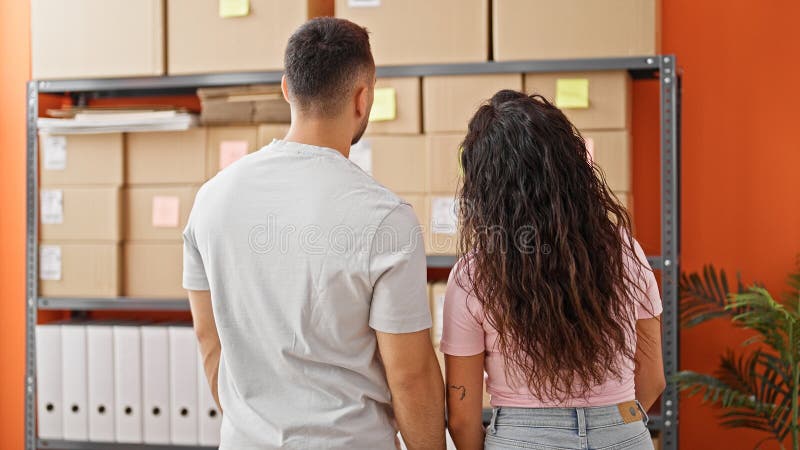 Man and Woman Ecommerce Business Workers Standing Together Backwards at ...